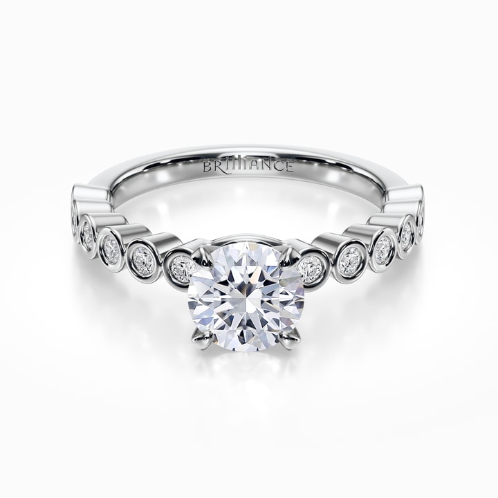 Modern Unique Bezel Set Engagement Ring In Platinum