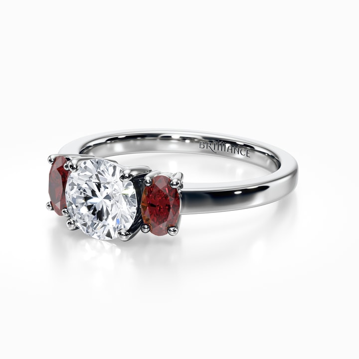 Three Stone Oval Ruby Engagement Ring In Platinum