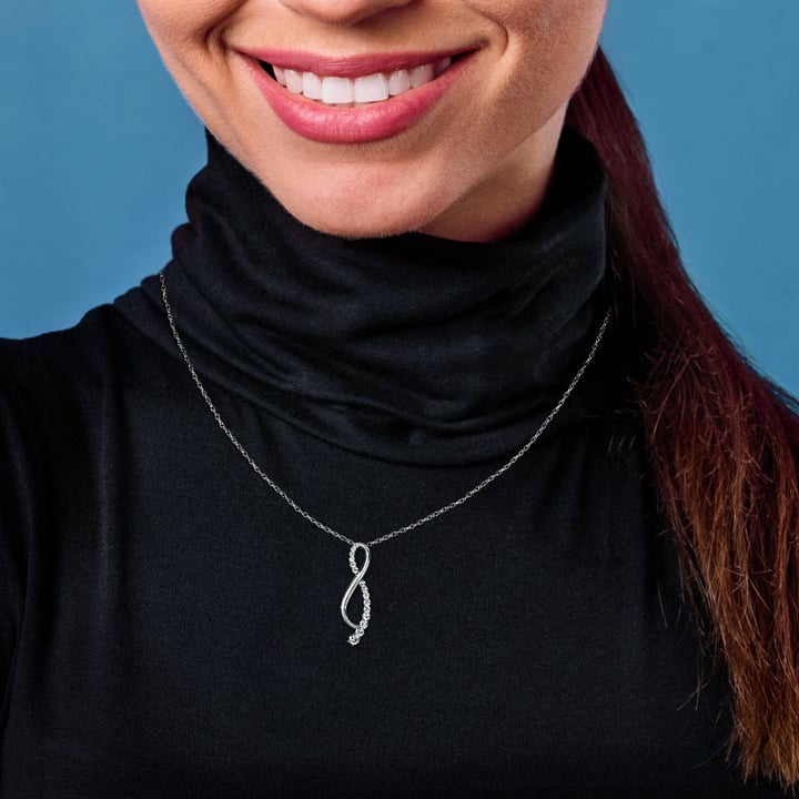 Swirl Diamond Journey Necklace in White Gold (1/2 ctw)