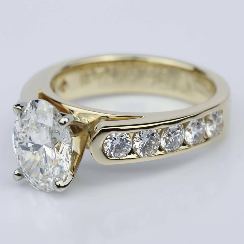 Oval Channel Set Diamond Engagement Ring In Yellow Gold