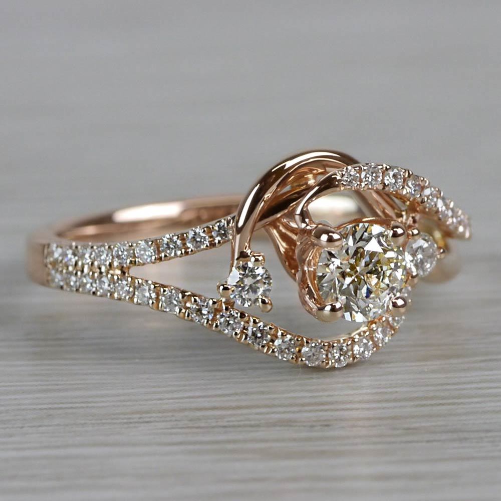 Sparkling Swirled Round Cut Diamond Rose Gold Engagement Ring